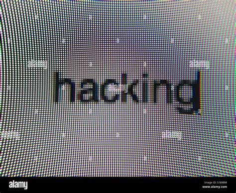 The Word Hacking Written In Small Capitals And Photographed From A Computer Screen Stock Photo