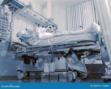 Comatose Patient In The Intensive Care Unit Under The Supervision Of