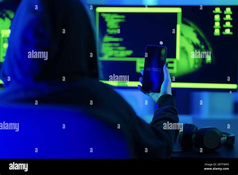 Anonymous Mobile Cyber Security Hacker Break Into And Unlock Phone To Steal Company Or Private