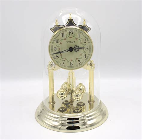 Vintage Anniversary Clock Glass Dome Brass Tone Spinning Weight Pendulum Analog Electric Quartz
