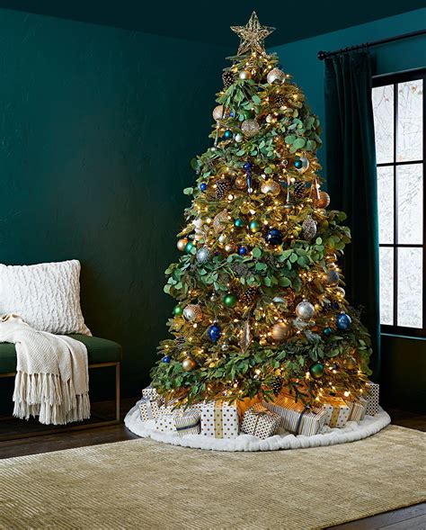 How To Decorate A Christmas Tree With Lights And Ornaments