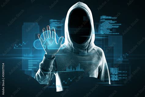 Hacker In Hoodie Using Abstract Blue Coding And Tech Information Hologram Interface Database