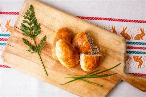 Russian pirozhki Stock Photo by ©maxsol7 83419032