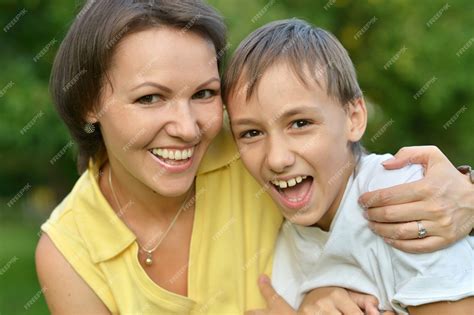 Premium Photo Son With His Mom On The Nature