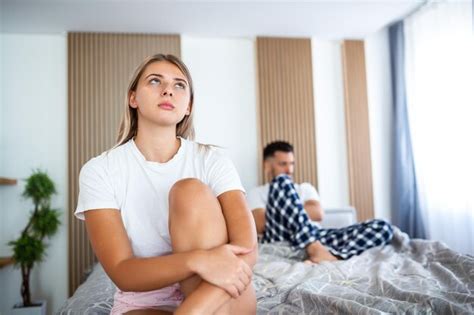 Premium Photo Frustrated Sad Girlfriend Sit On Bed Think Of