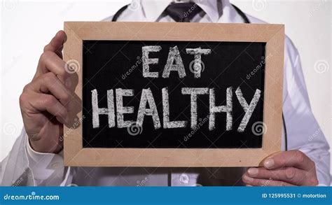 eat healthy diet recommendation written on blackboard in nutrition