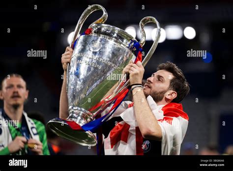 Khvicha Kvaratskhelia Of Paris Saint Germain Celebrates With The Trophy