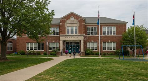 Two Story Brick Public School Building With A Central Entrance