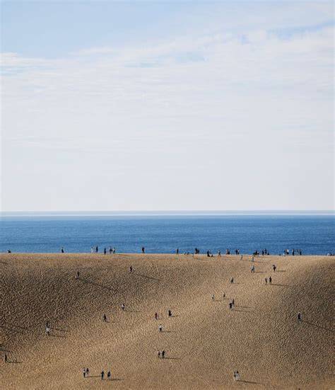 바다가 보이는 광활한 모래 언덕 풍경 · 무료 스톡 사진