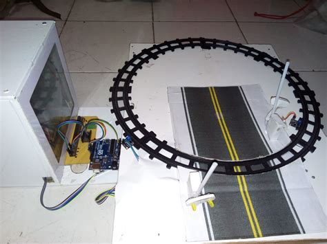 Belajar Mikrokontroler 2016 Pengatur Palang Pintu Kereta Otomatis