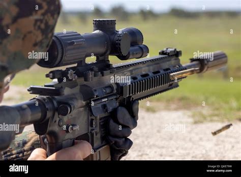 A Midshipman With The Naval Reserve Officers Training Corps Fires The M27 Assault Rifle During