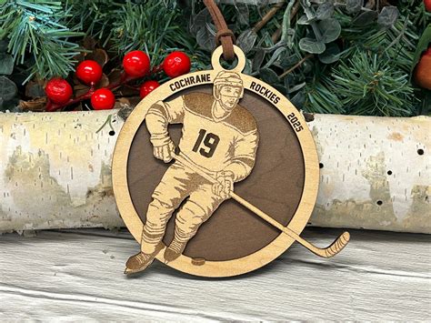 Engraved Hockey Player Ornament Bouncing Off The Walls