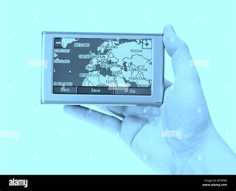 GPS Vehicle Navigation System In A Man Hand Stock Photo Alamy