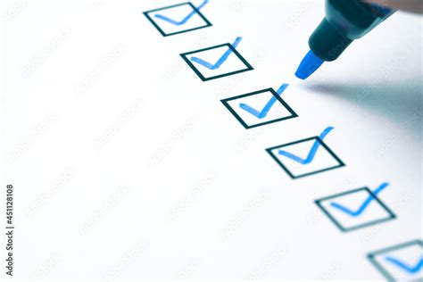 Blue Marking On Checklist Box With Pen Checklist Concept Stock Photo Adobe Stock