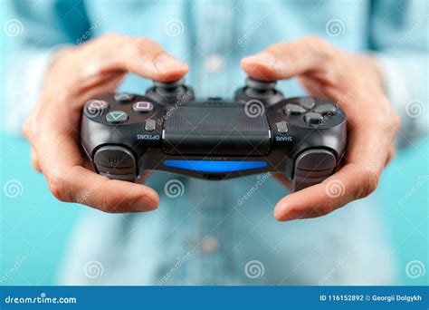 Male Hands Holding A PS Controller Editorial Photography Image Of Gamepad Accessory