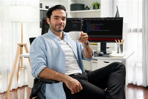 Profile It Looking Camera Holding Coffee Cup Against Coding On Pc Surmise Stock Image Image