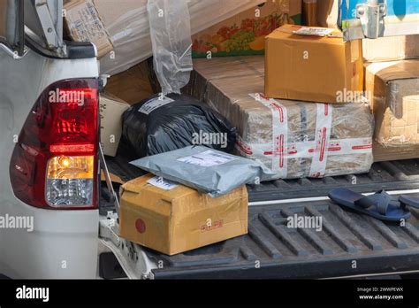 Packages On The Pick Up Car Of Parcel Service Is Ready For Delivery