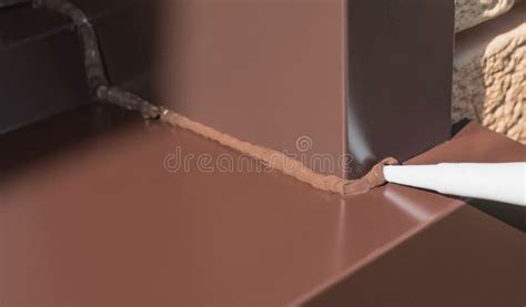 Applying Silicone Sealant To A Metal Joint Stock Image Image Of Tool Floor 316937057