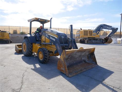 John Deere 210l Ep Skip Loader 138 For Sale Used Heavy Equipment Heavy Metal Equipment