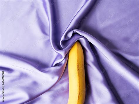 Sex And Orgasm Concept With Banana On Crumpled Silk Sheet Stock Photo Adobe Stock