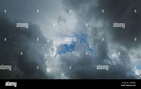 Background With Blue Sky And Dark Storm Cumulus Clouds Hi Res Stock