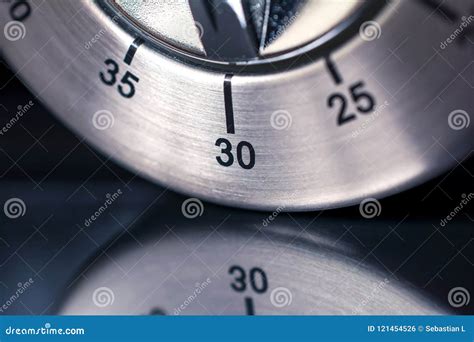 30 Minutes Macro Of An Analog Chrome Kitchen Timer With Dark 30 Minutes Macro Of An Analog Chrome Kitchen Timer With Dark