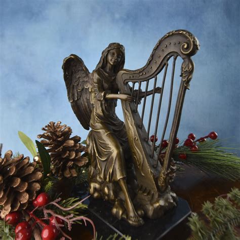Angel Playing The Harp Bronze Sculpture In A Holiday Arrangement