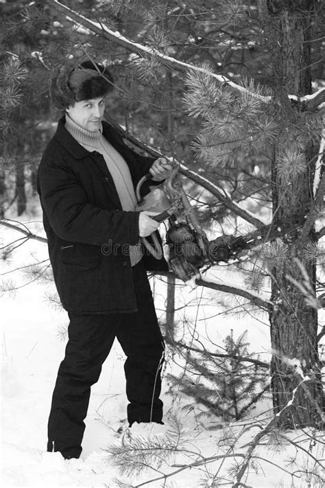 A Man Saws A Tree With A Chainsaw Friendship Cosplay For The Movie Girls Stock Image Image Of