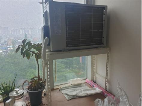 틀수록 더 더워요방 안에 에어컨 실외기 설치한 기사 아시아경제