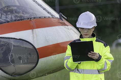 Technician Fixing The Engine Of The Airplane Female Aerospace Engineering Checking Aircraft