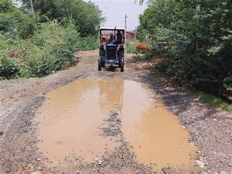 Roads Of The City Were Broken Due To Unseasonal Rains Water Filled On