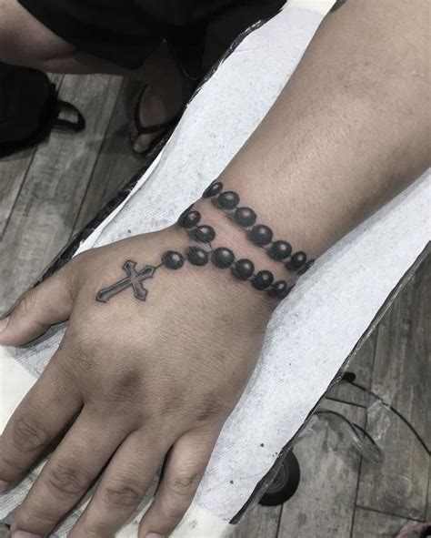 Rosary Wrist Tattoo