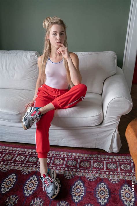 Photo Session With Skinny Alecia Fox Posing On The White Sofa 12 Photos