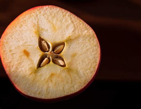 An Artistic Close Up Of An Apple S Cross Section Revealing Its Seeds And Intricate Core