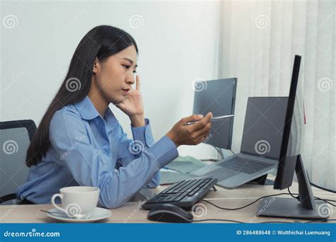 Stress Asian Woman While Coding Data Programmer On Desktop Pc While Working On Computer Codes In