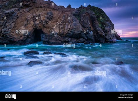 Waves In The Pacific Ocean And The Keyhole Rock At Pfeiffer Beach In