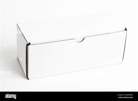 A Close Up Studio Shot Of A Generic Closed White Packaging Box Set On A