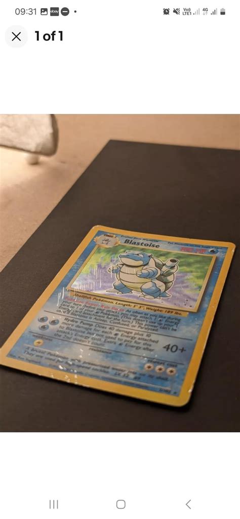 Im Assuming This Base Set Blastoise Is Fake With The Rainbow Holo