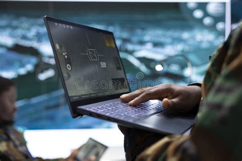 Intelligence Specialist Monitoring A World Map And Surveillance Imagery Stock Image Image Of