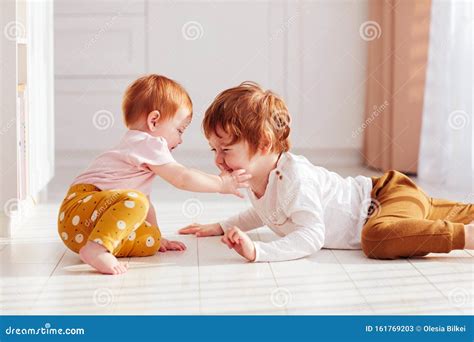 Cute Happy Redhead Siblings Brother And Sister Having Fun Together
