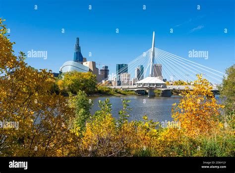 The City Skyline With Fall Foliage Color Along The Red River St