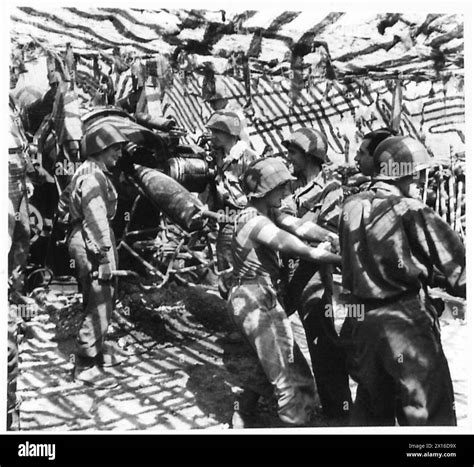 A 230 Mm Artillery Gun Of An American Field Regiment Is Loaded During A