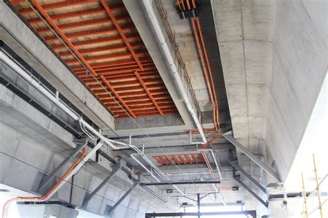 Timber Falsework Covers The Void Where Escalators And Lifts Will Serve The Future Elevated