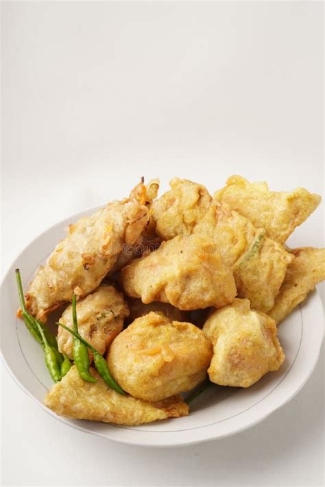 A Plate Of Assorted Fried Snacks Including Stuffed Tofu Tempeh And