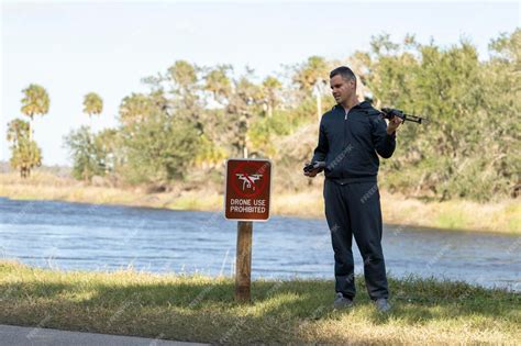 Premium Photo Operator Is Disappointed Because He Can Not Fly His Quadcopter In National Park