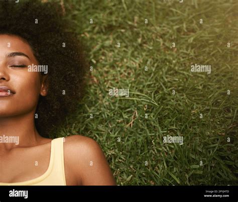 Sleep Grass And Mockup With A Black Woman Lying On A Field From Above