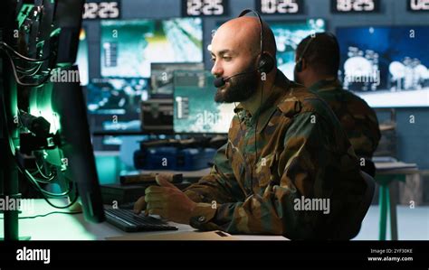 Soldier Solving Tasks In Military Hq Base Gathering Information On