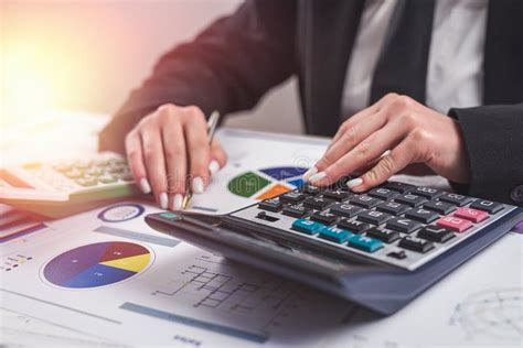 Business Woman Working With Annual Financial Report And Doing Planning