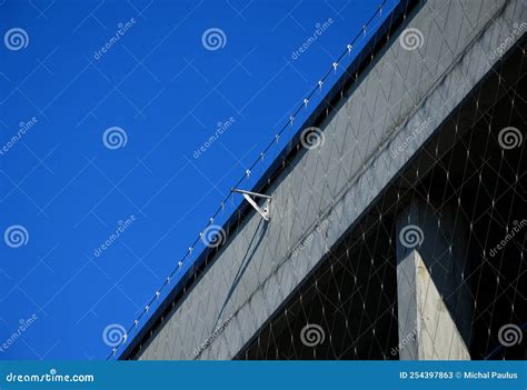 In Front Of The Facade With The Balconies Is A Tensioned Cable Network