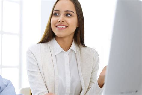 Business Woman And Man Sitting And Working With Computer In Office Colleagues Discussing